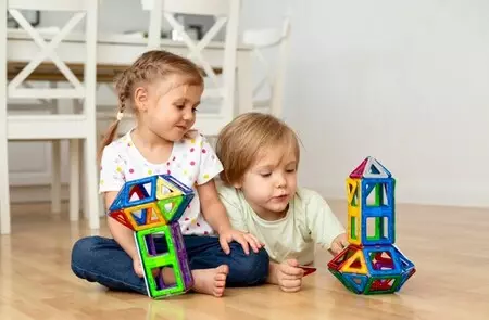 Boy Girl Home Playing Toys Together 23 2148630635