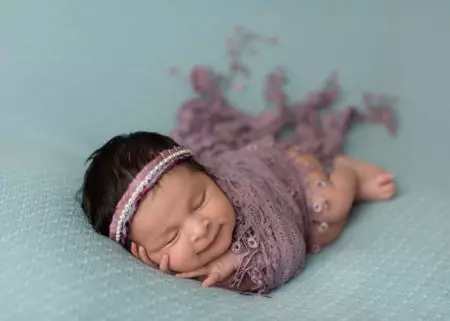Fantastisk serie bilder av nyfødte som smiler 16530_17