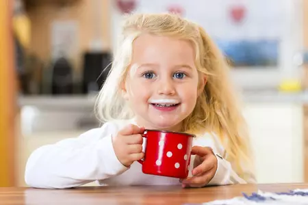 girl drinking milk