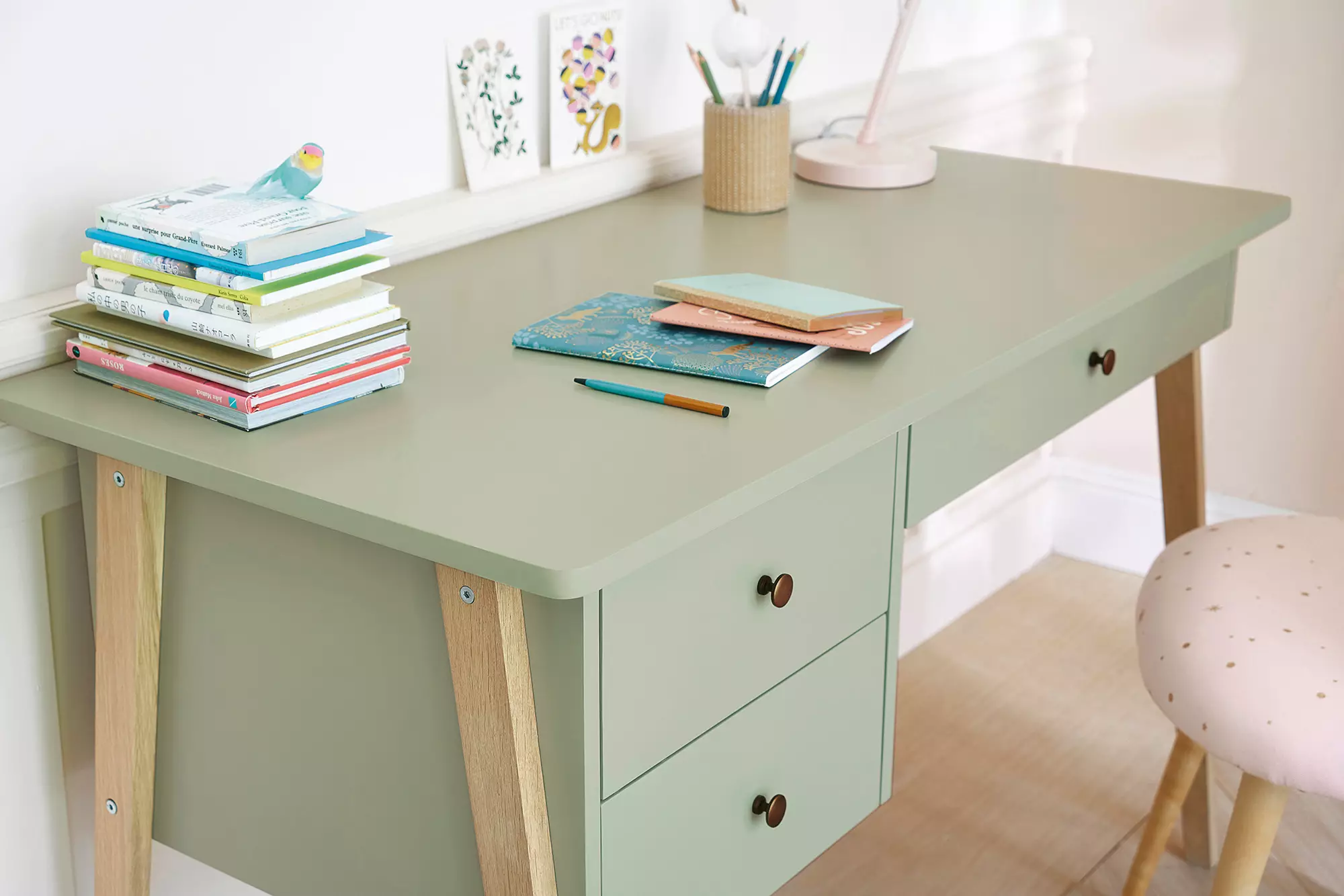 Children's desk with one door and two green drawers with oak legs