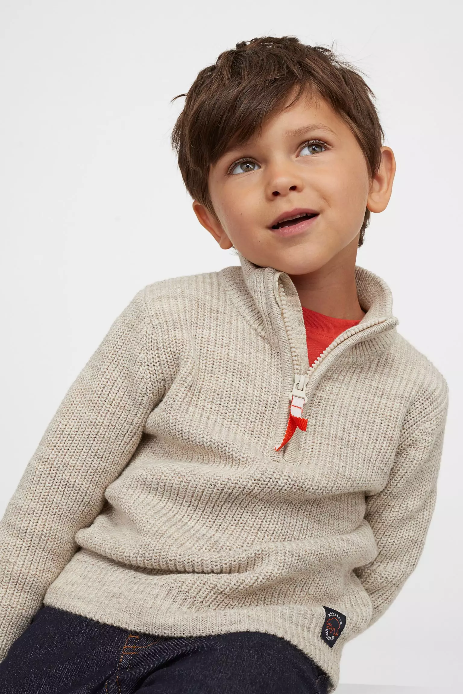 Jumper in soft cotton jersey with a ribbed stand-up collar and a half-zip.